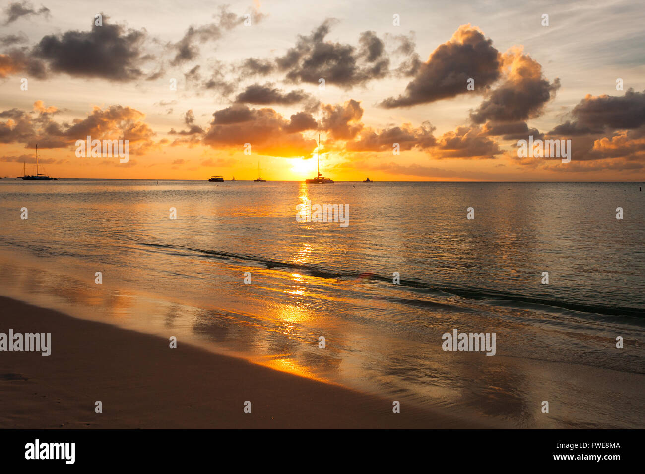 Sailing ship at sunset Stock Photo - Alamy