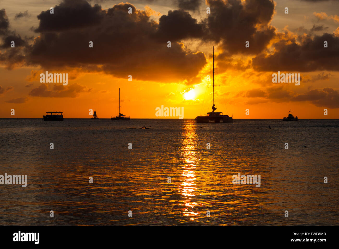 Sailing ship at sunset Stock Photo - Alamy