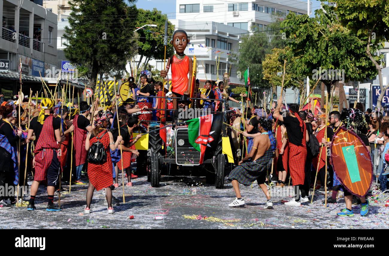 Happy people in teams dressed with colorful costumes at famous Limassol ...