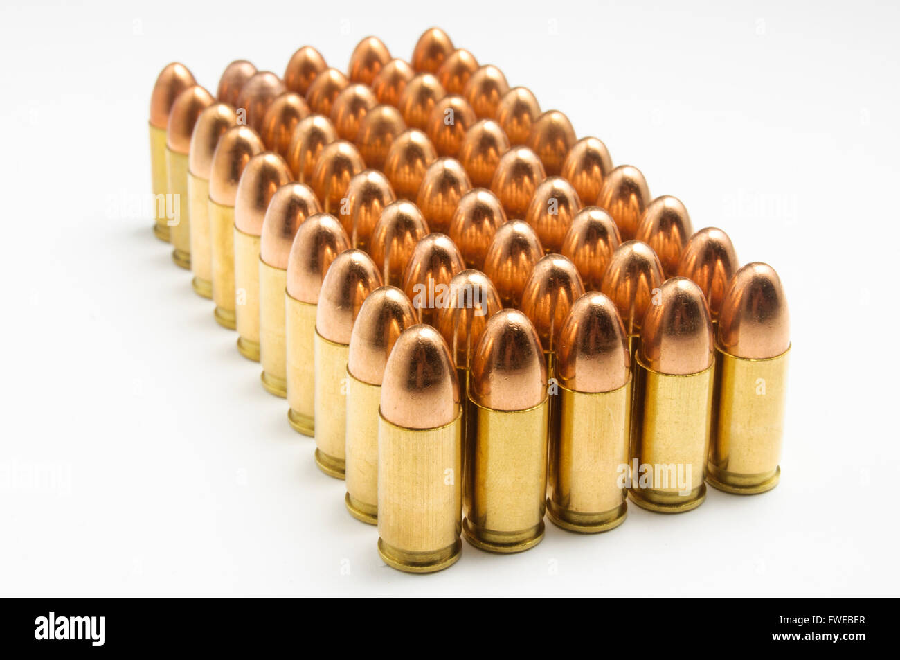 9mm bullets in a row Stock Photo - Alamy