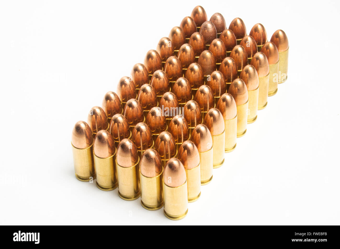 9mm bullets in a row Stock Photo - Alamy