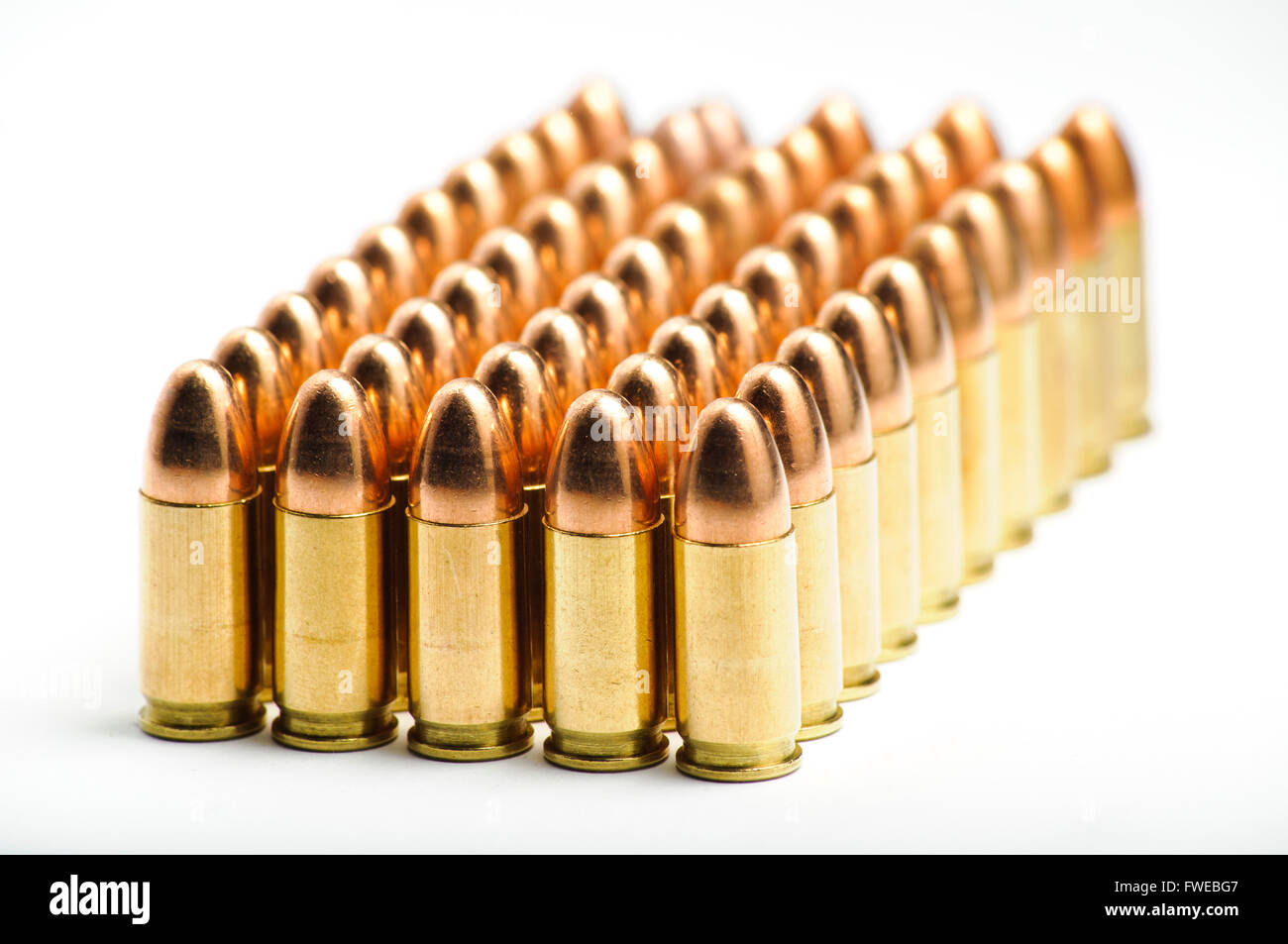 9mm bullets in a row Stock Photo - Alamy