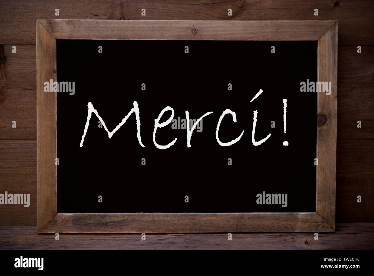 Chalkboard With Merci Means Thank You Stock Photo - Alamy