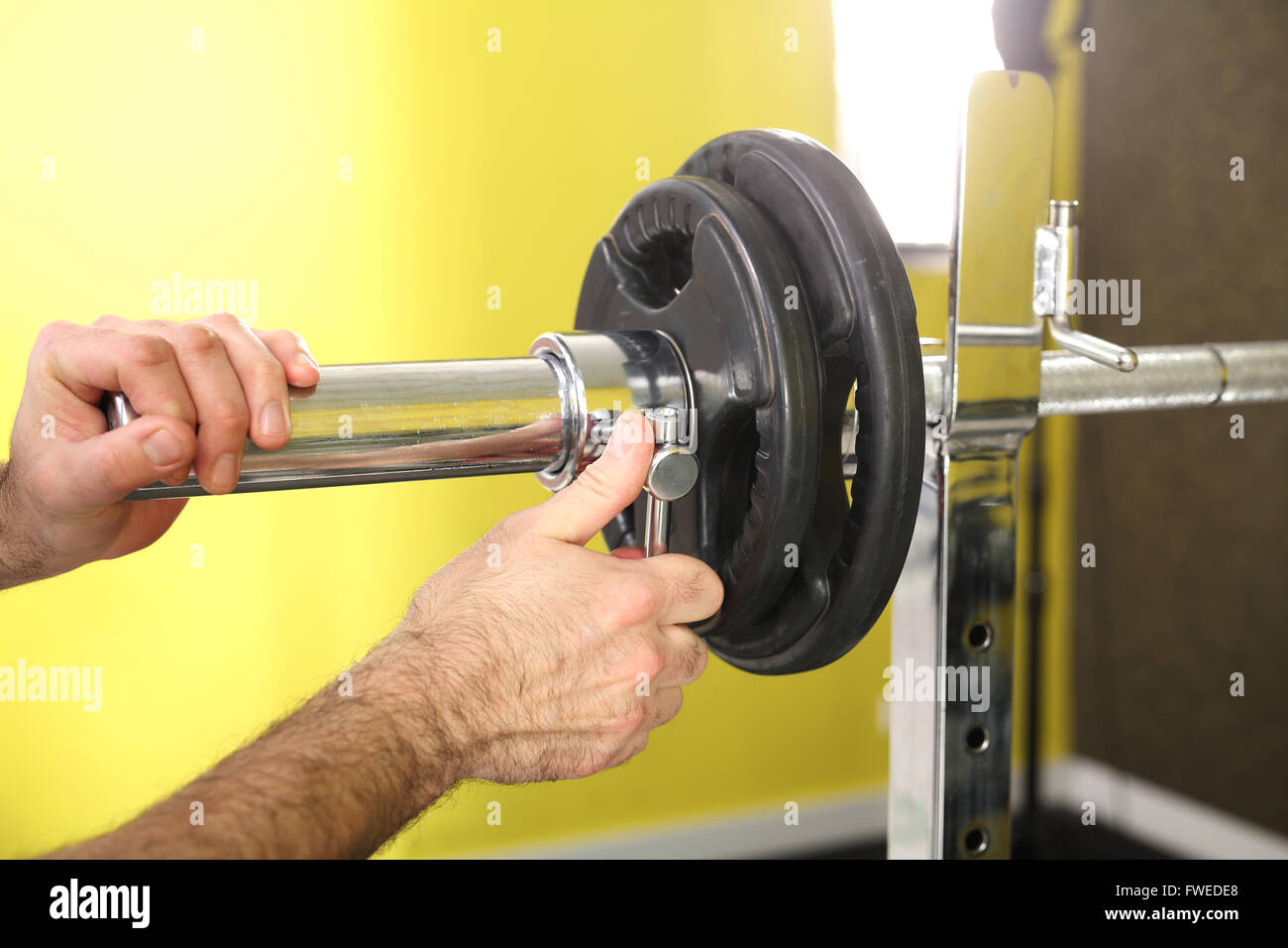 Barbell, the coach does load. Equipment gym equipment dumbbell, barbell ...