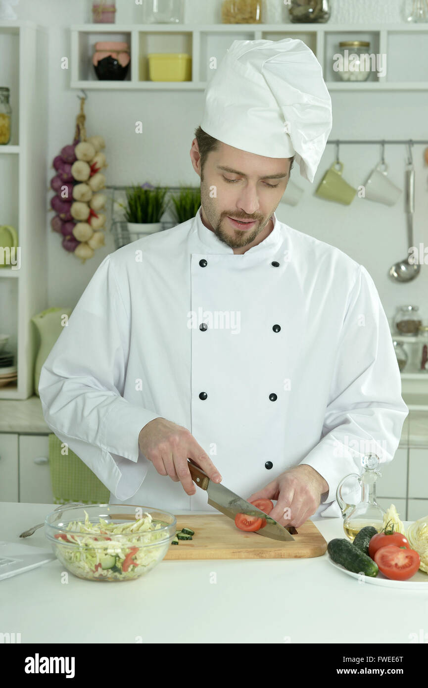 Man cooking in kitchen Stock Photo - Alamy