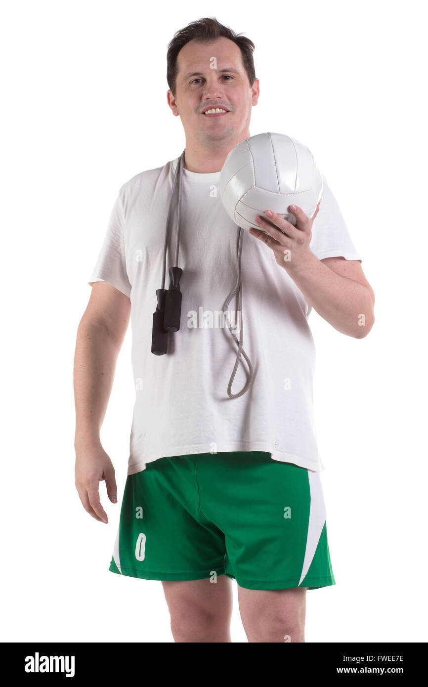 Happy adult man in sport uniform with white ball and skipping rope ...
