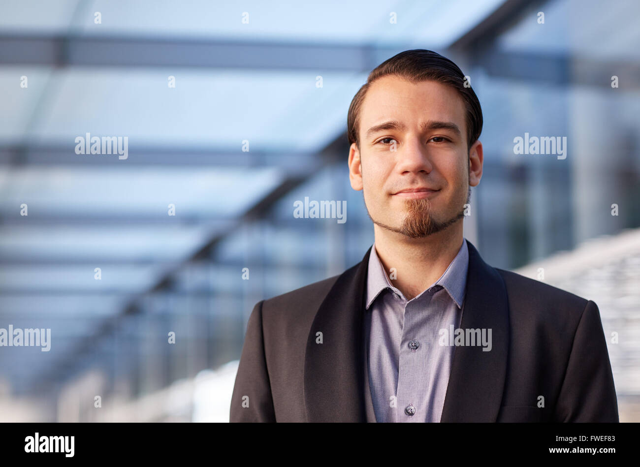 Smiling subtly hi-res stock photography and images - Alamy