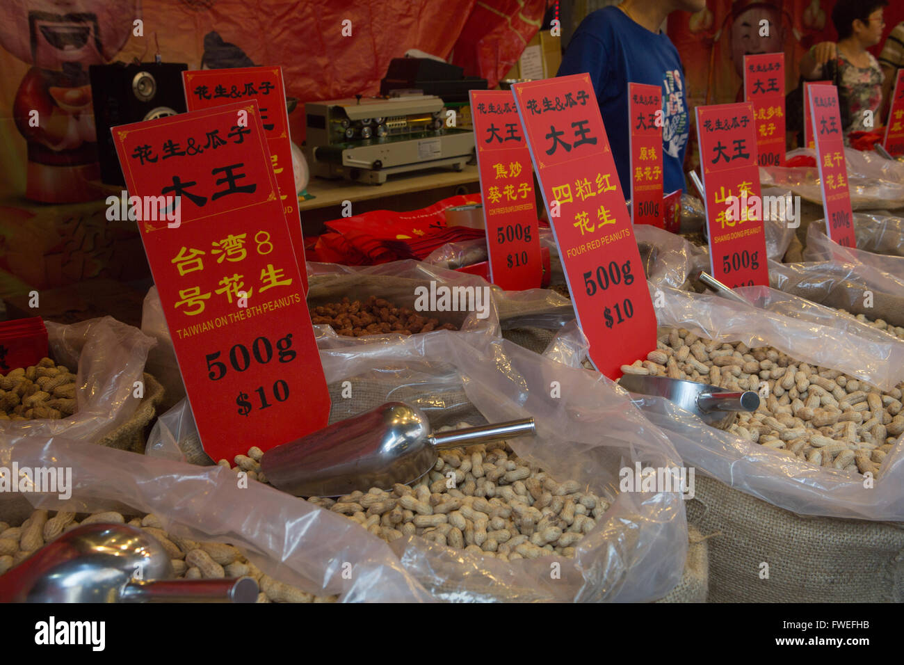 Chinatown market stall selling peanuts Stock Photo - Alamy