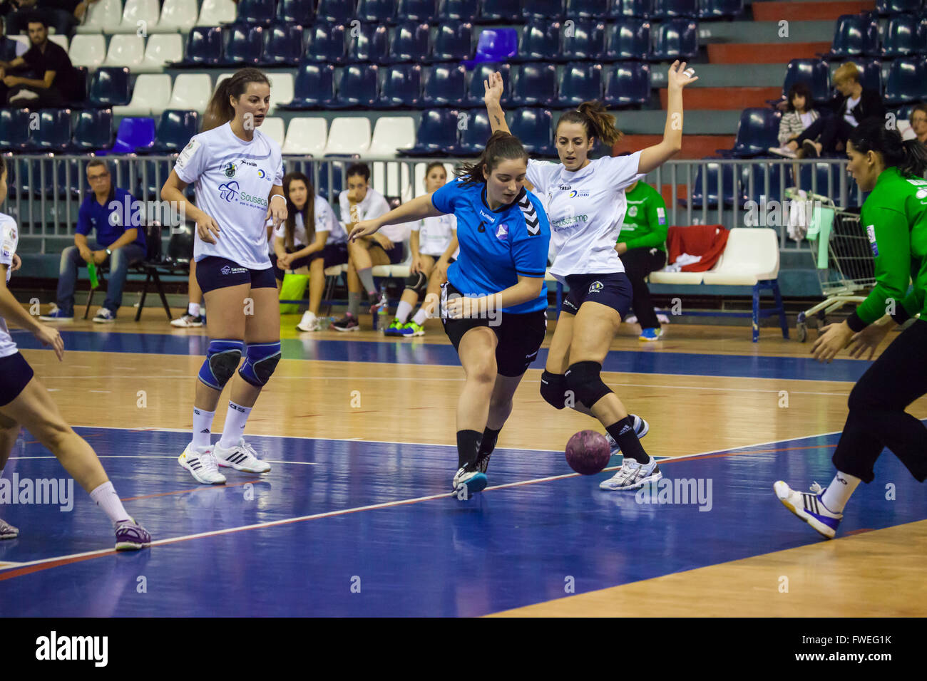 young women handball match held in a sports centre Stock Photo - Alamy