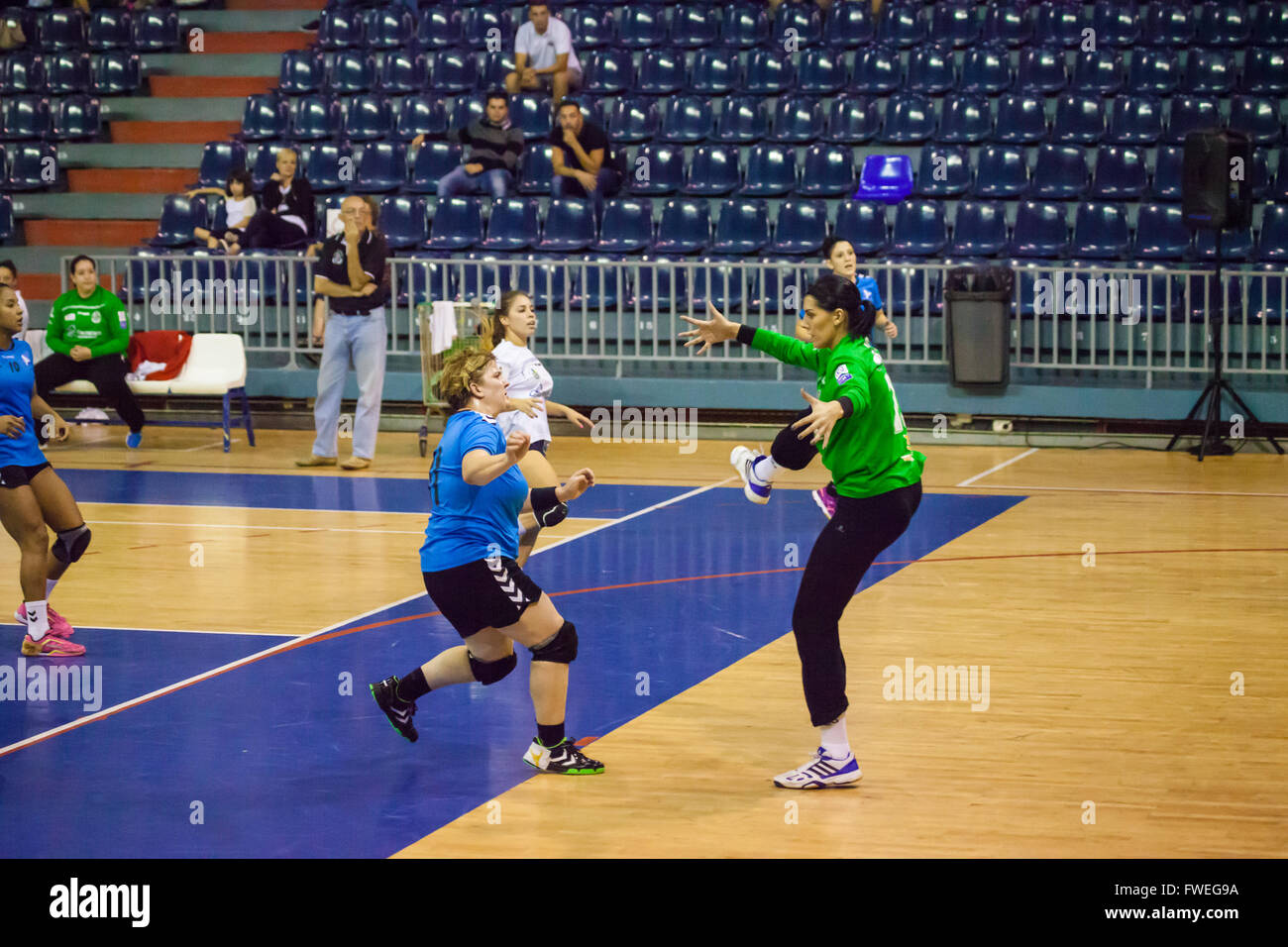 young women handball match held in a sports centre Stock Photo - Alamy
