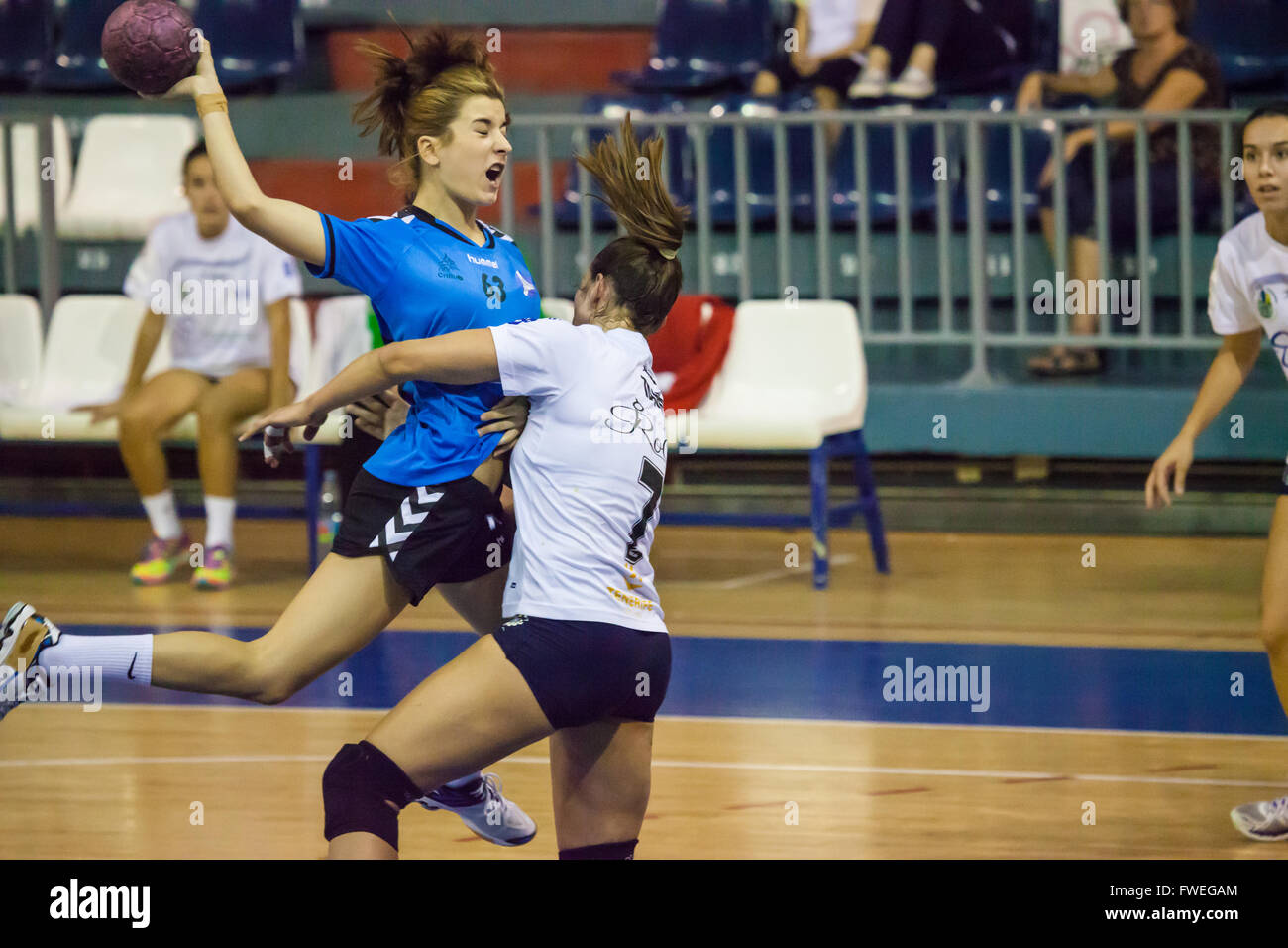 young women handball match held in a sports centre Stock Photo - Alamy