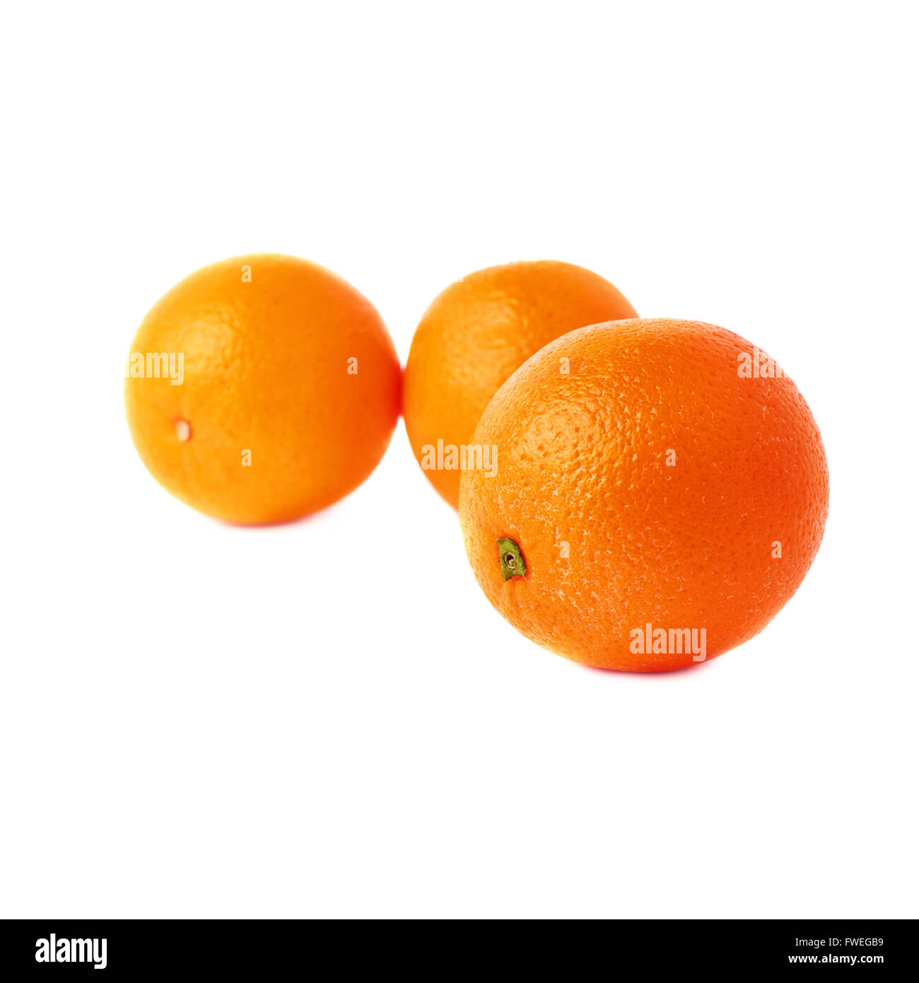 Pile of multiple ripe oranges, isolated over the white background Stock ...