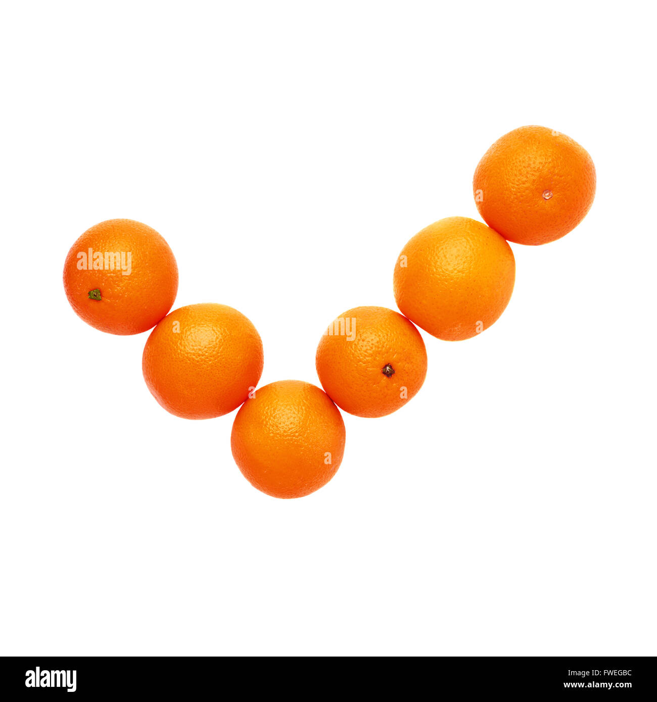 Yes tick mark made of multiple oranges isolated over the white ...