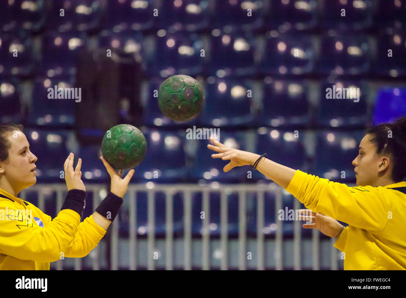 young women handball match held in a sports centre Stock Photo - Alamy