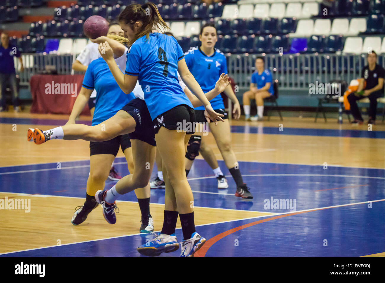 young women handball match held in a sports centre Stock Photo - Alamy