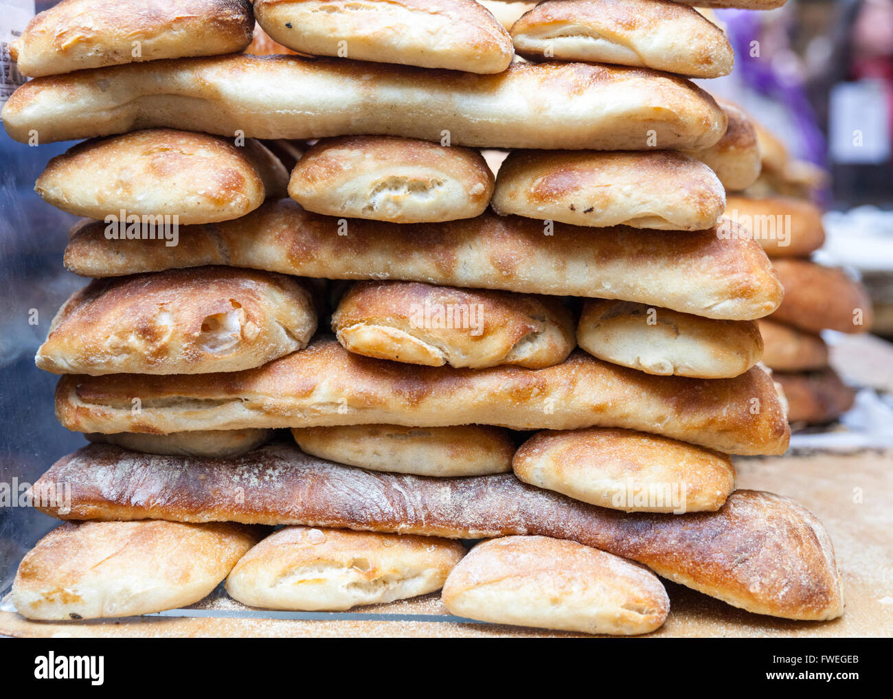Stack of fresh Italian ciabatta bread at market stall Stock Photo - Alamy