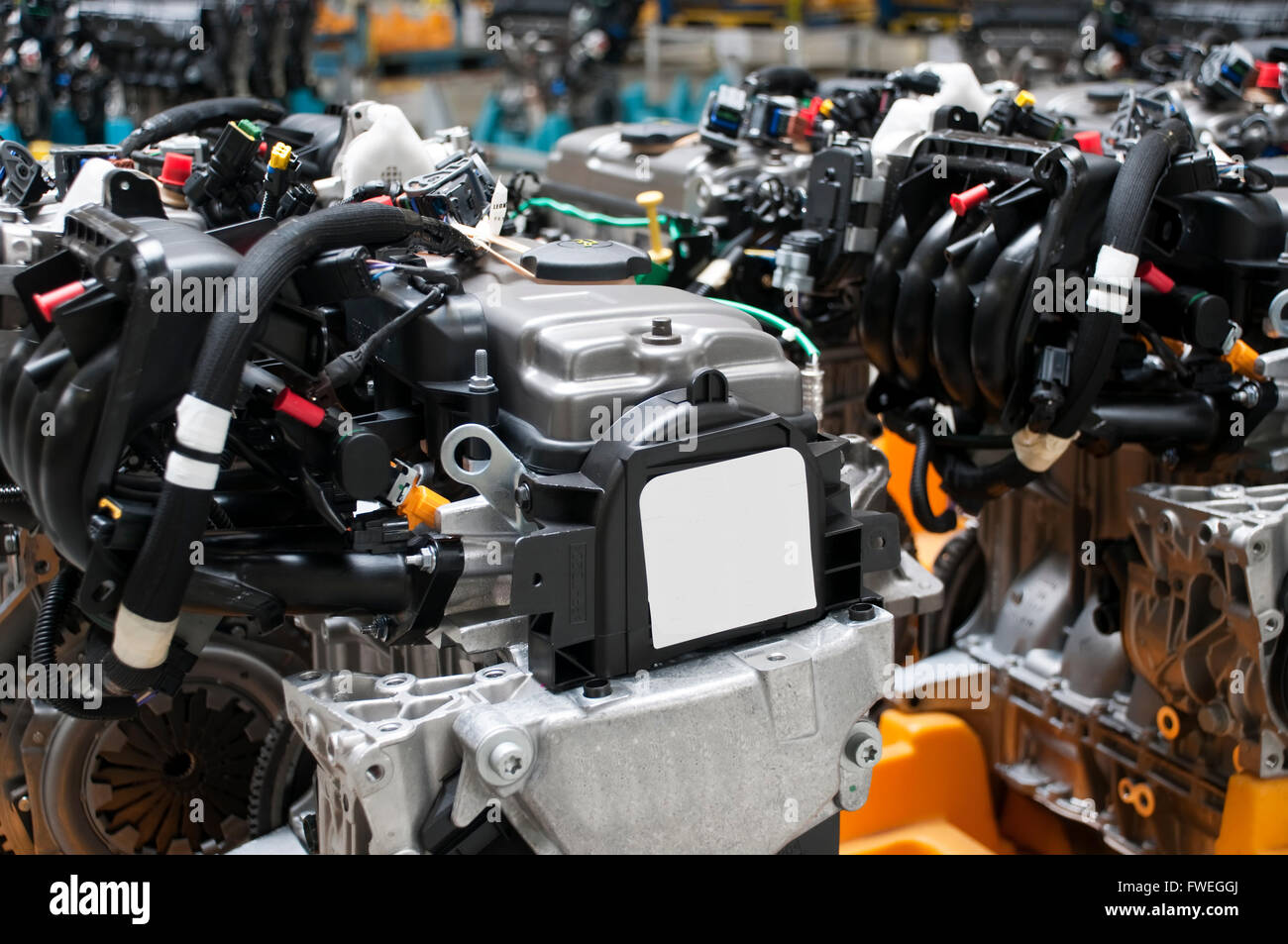 Automotive industry - engines in a row waiting for installation Stock ...