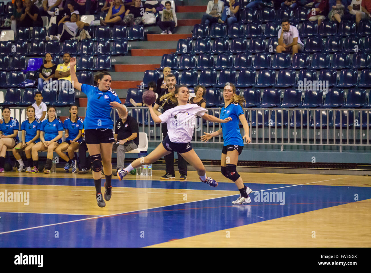 young women handball match held in a sports centre Stock Photo - Alamy