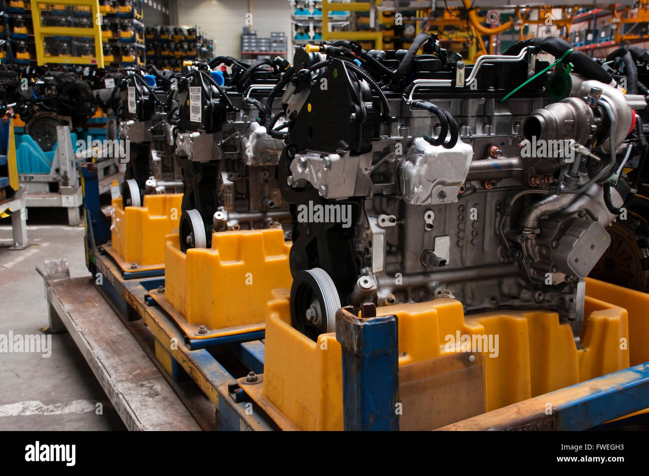 Automotive industry - engines in a row waiting for installation Stock ...