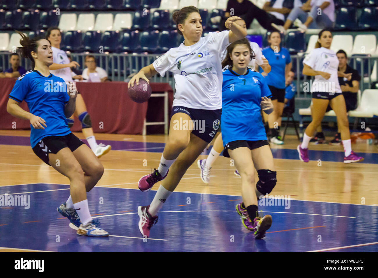 young women handball match held in a sports centre Stock Photo - Alamy