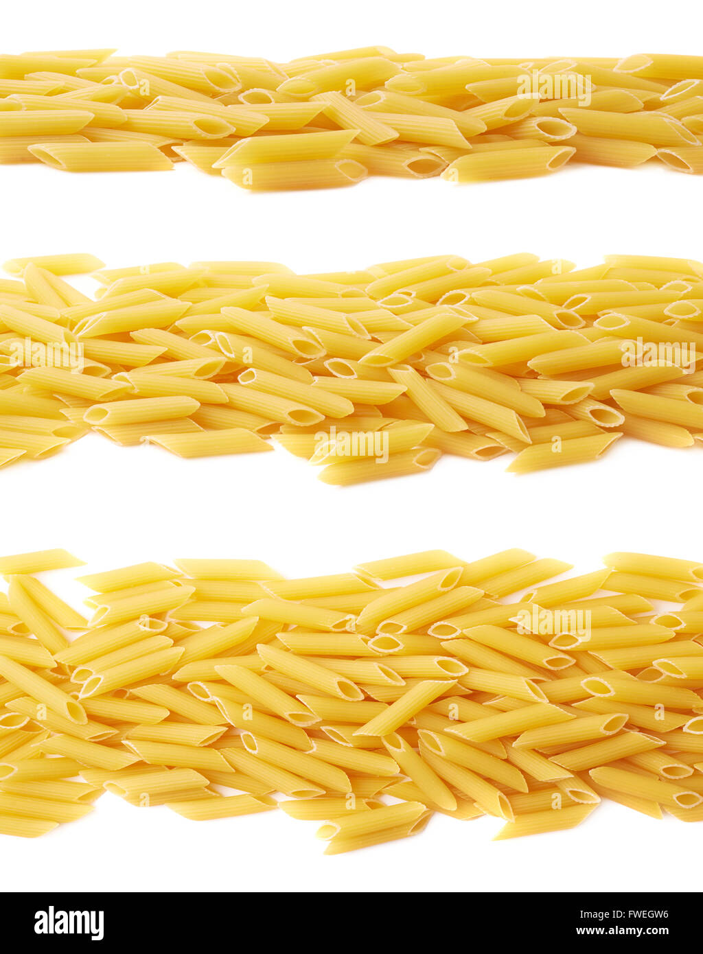 Pile of dried penne pasta isolated Stock Photo - Alamy