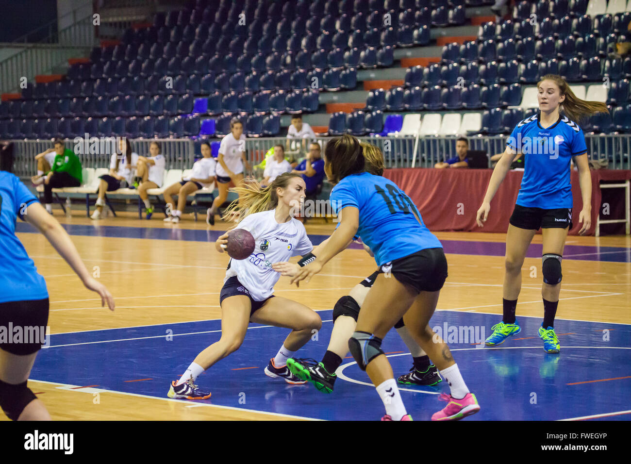 young women handball match held in a sports centre Stock Photo - Alamy