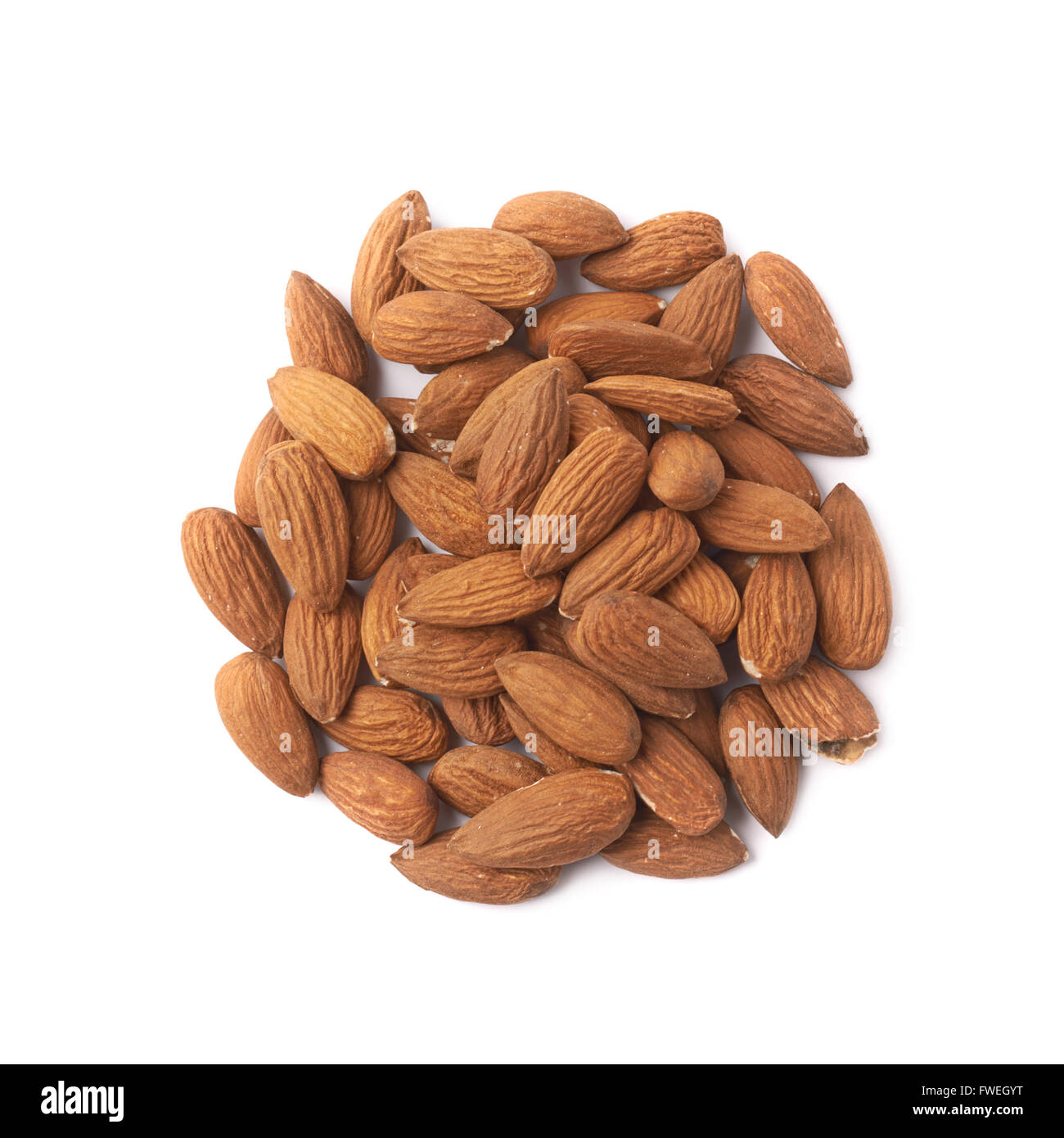 Pile of multiple almond seeds isolated Stock Photo - Alamy