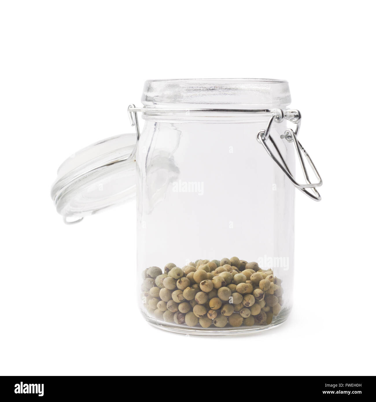 Glass jar filled with green peppercorn Stock Photo - Alamy
