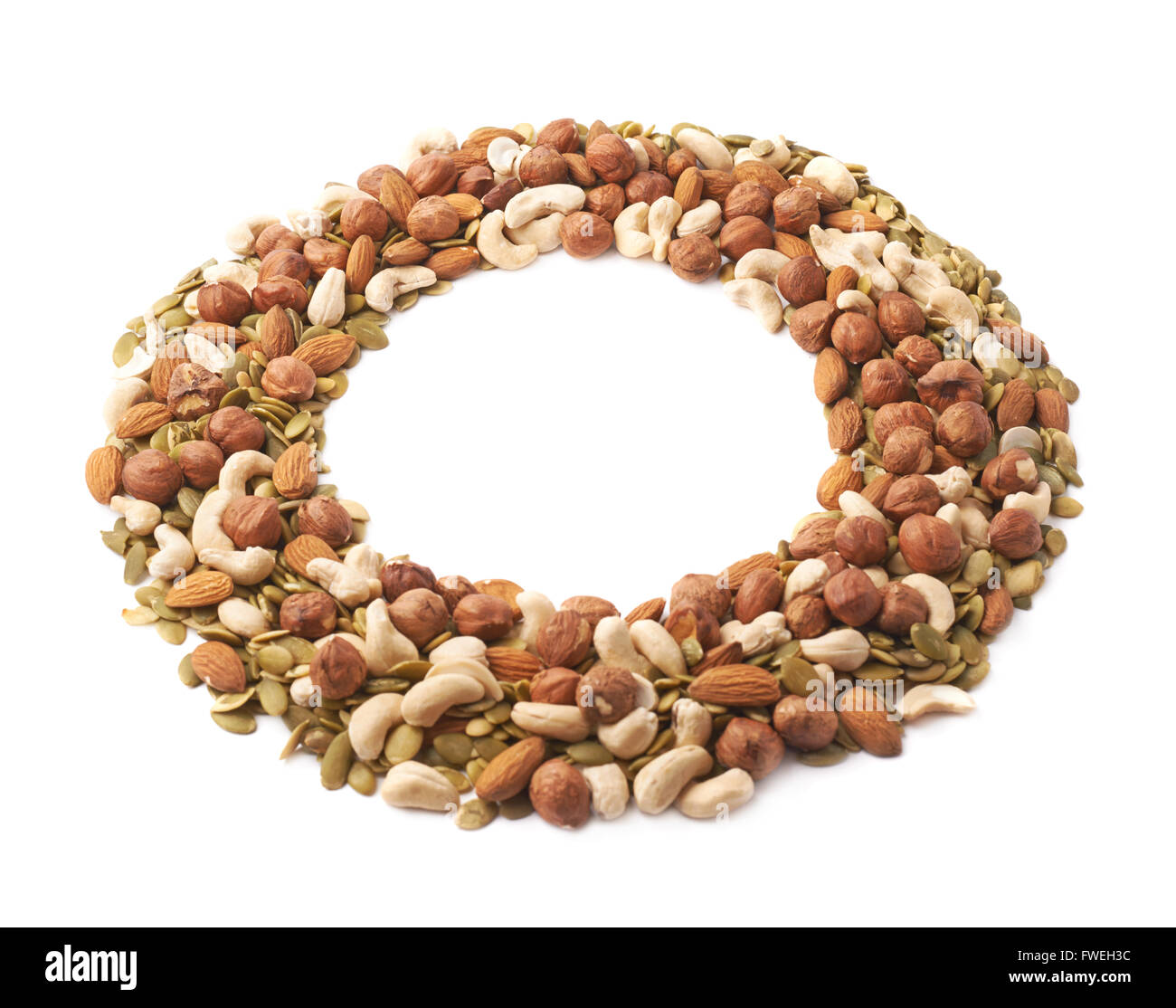 Round frame of nuts and seeds Stock Photo - Alamy