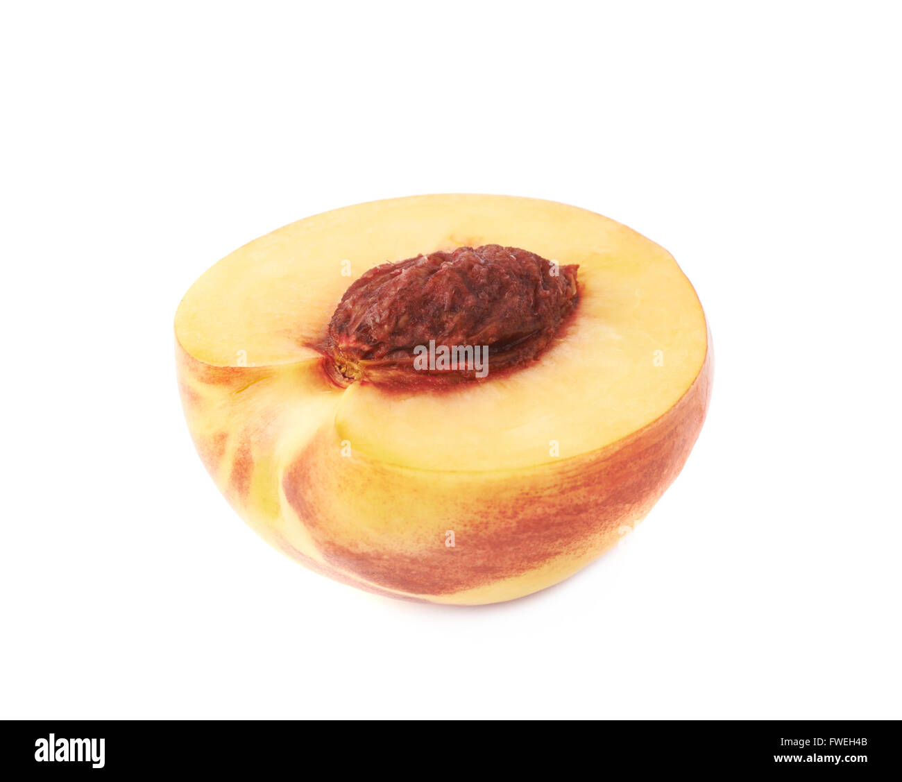 Cut open nectarine half isolated Stock Photo - Alamy