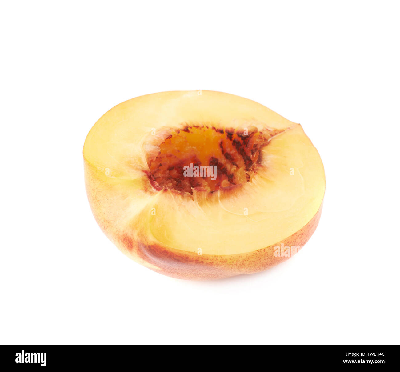 Cut open nectarine half isolated Stock Photo - Alamy