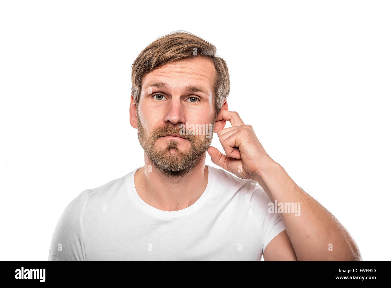 Man Scratching in His Ear. Isolated on white Stock Photo - Alamy