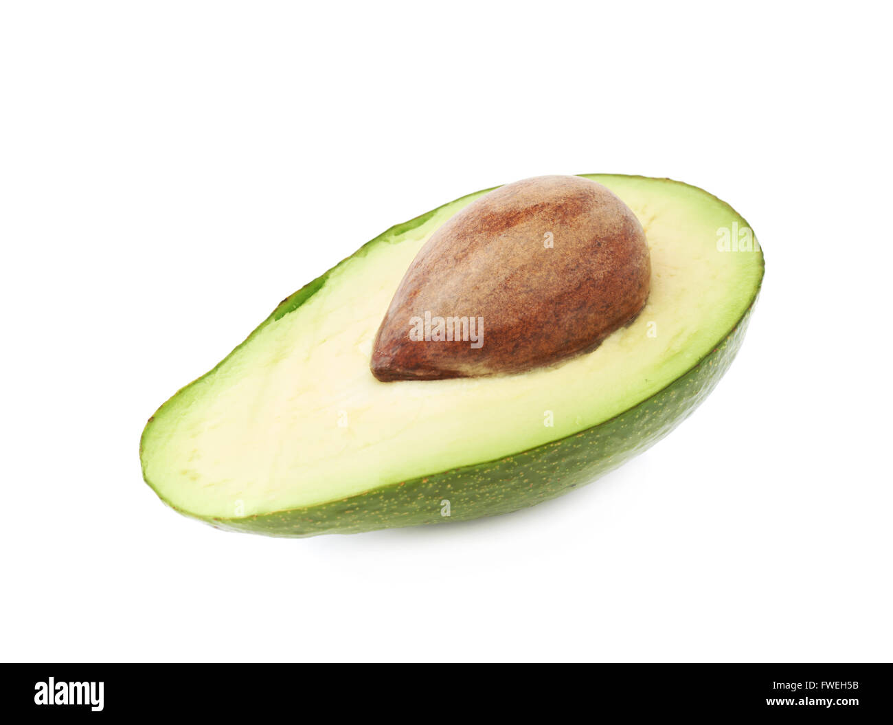 Cut in half open avocado fruit Stock Photo - Alamy