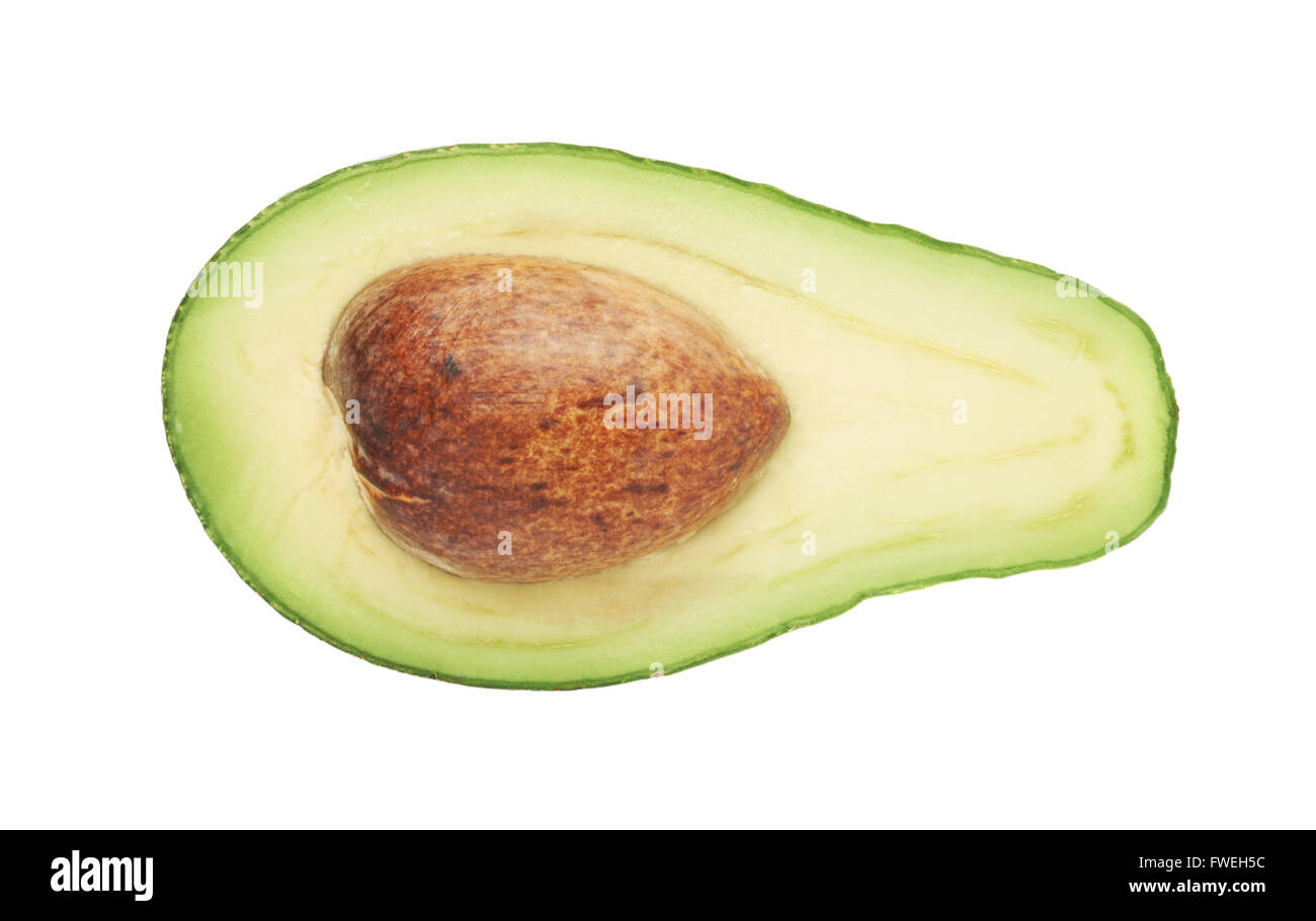 Cut in half open avocado fruit Stock Photo - Alamy
