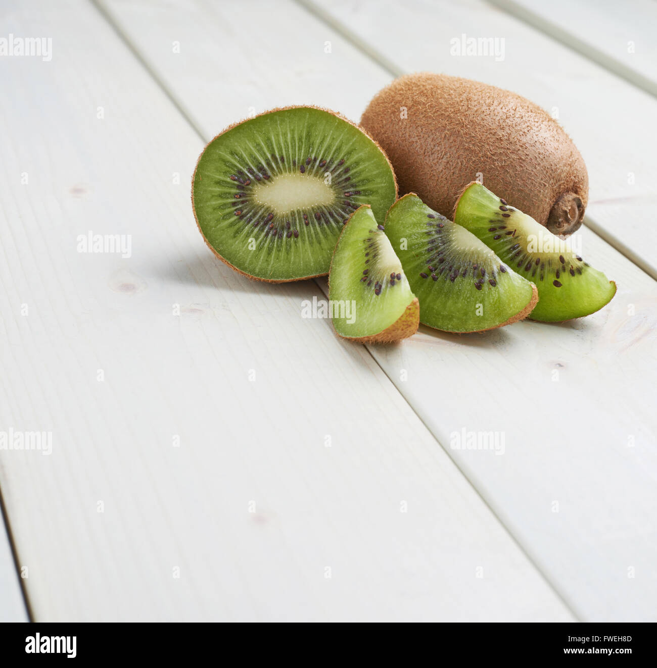 Two sliced kiwifruits composition Stock Photo - Alamy