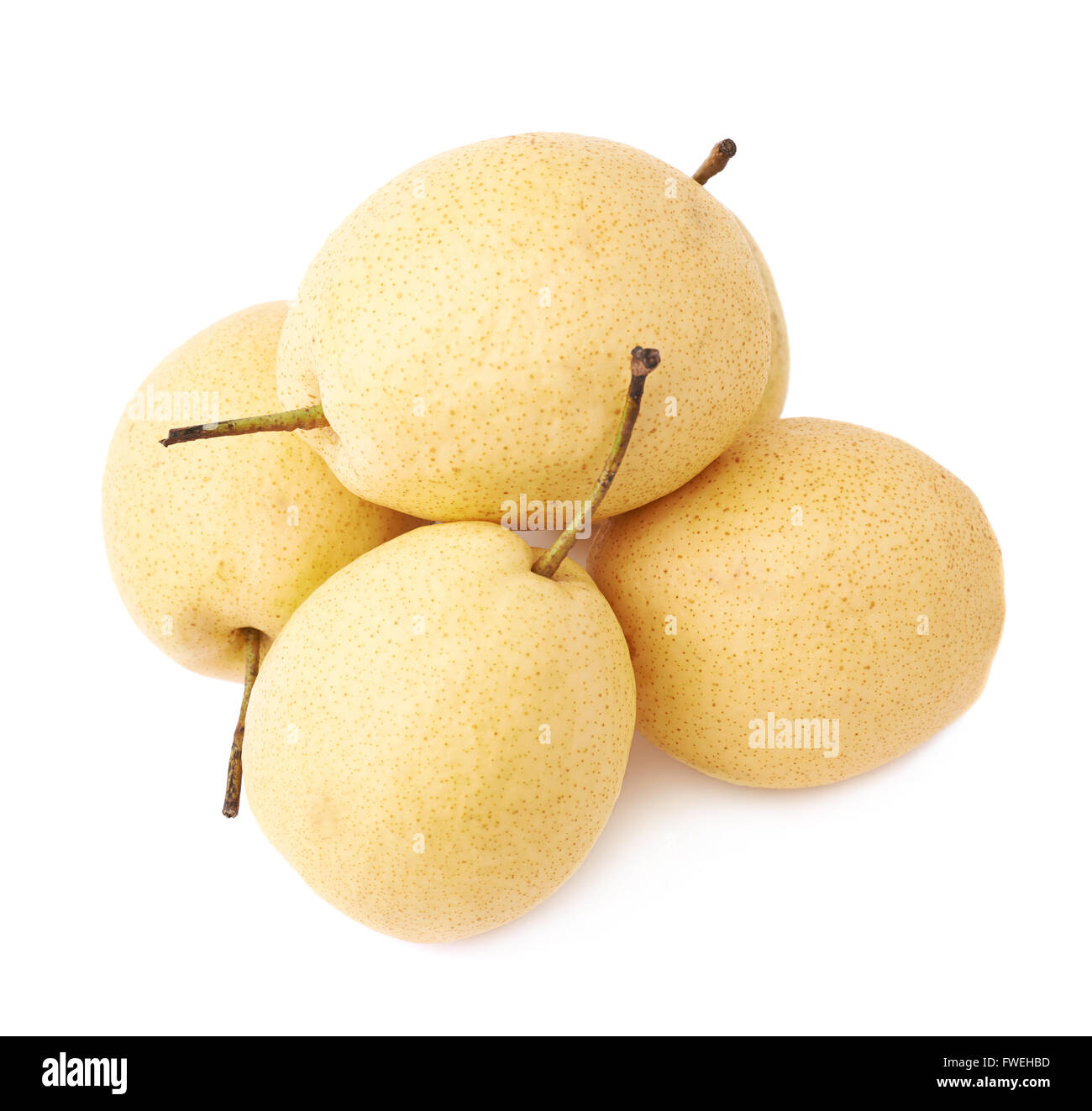 Pile of multiple yellow pears isolated Stock Photo - Alamy