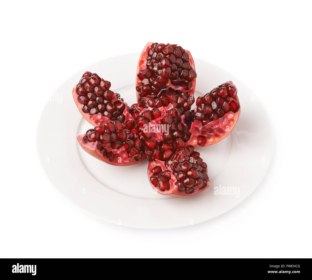 Split open pomegranate fruit Stock Photo - Alamy