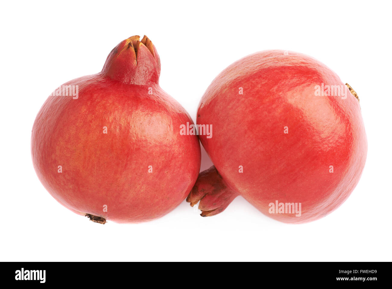 Two pomegranate composition isolated Stock Photo - Alamy