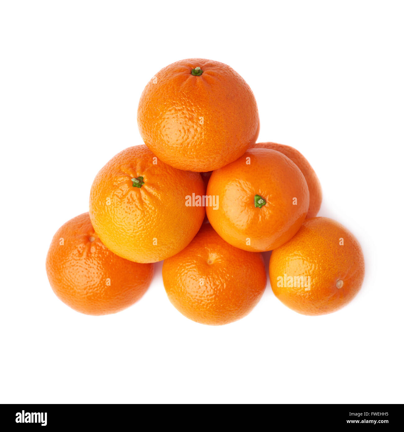Pile of multiple ripe fresh juicy tangerines, isolated over the white ...