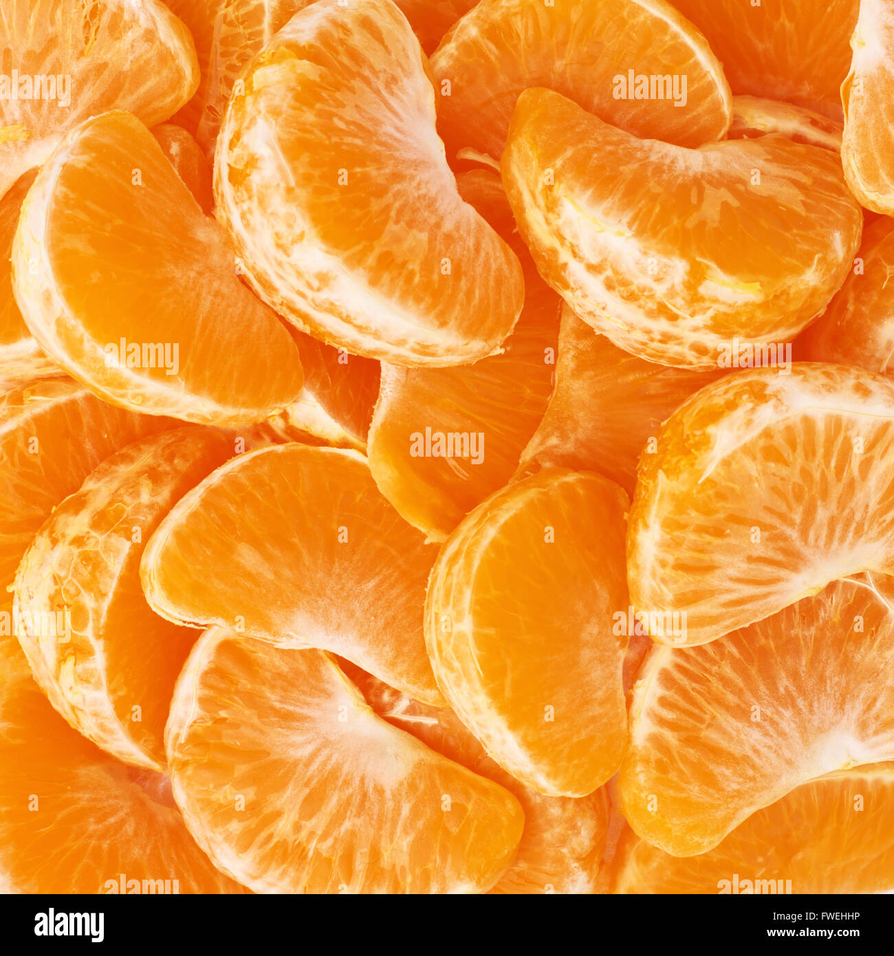 Pile of slice sections of fresh tangerine texture background Stock ...