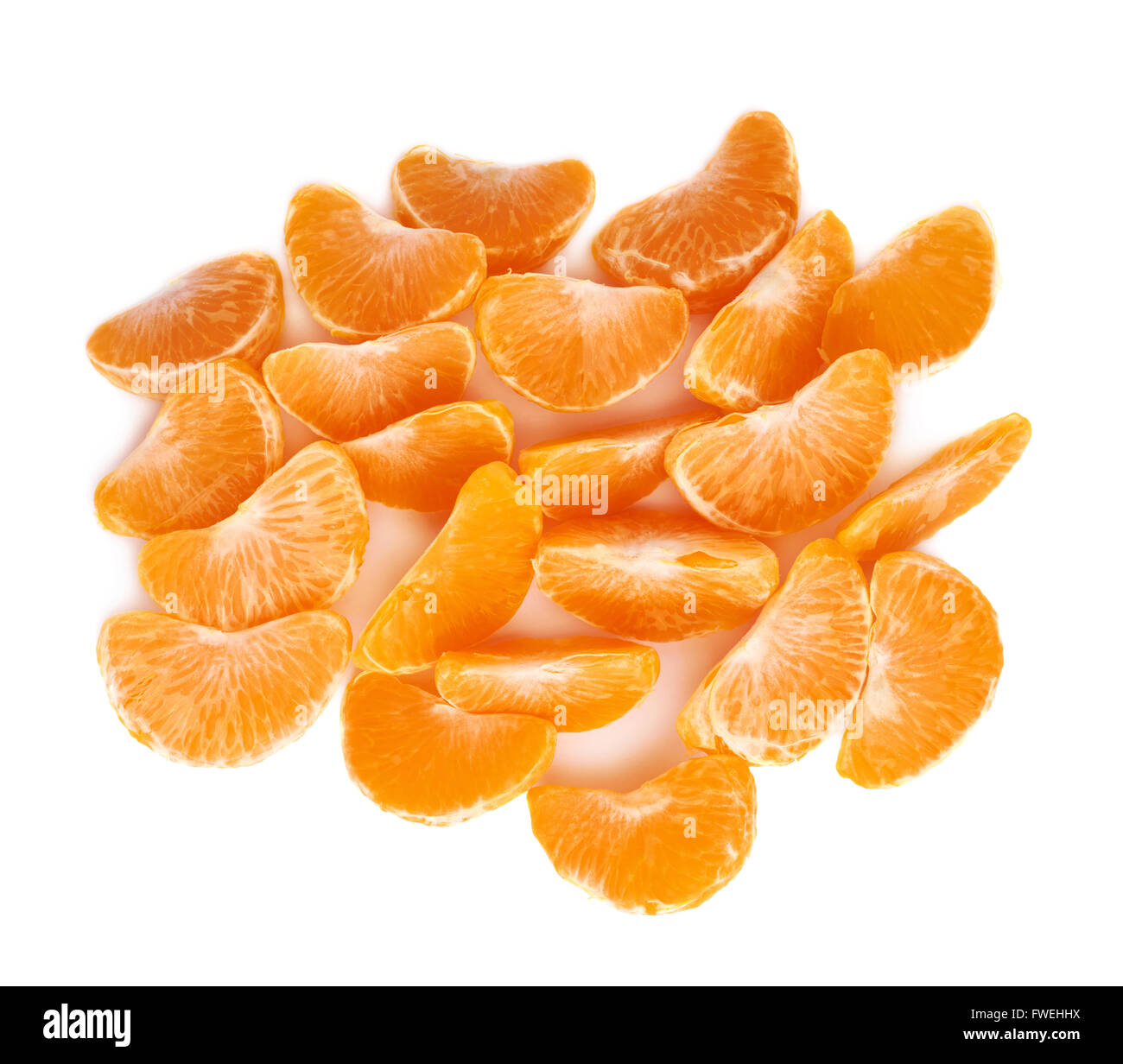 Surface covered with slice sections of tangerine isolated over the ...