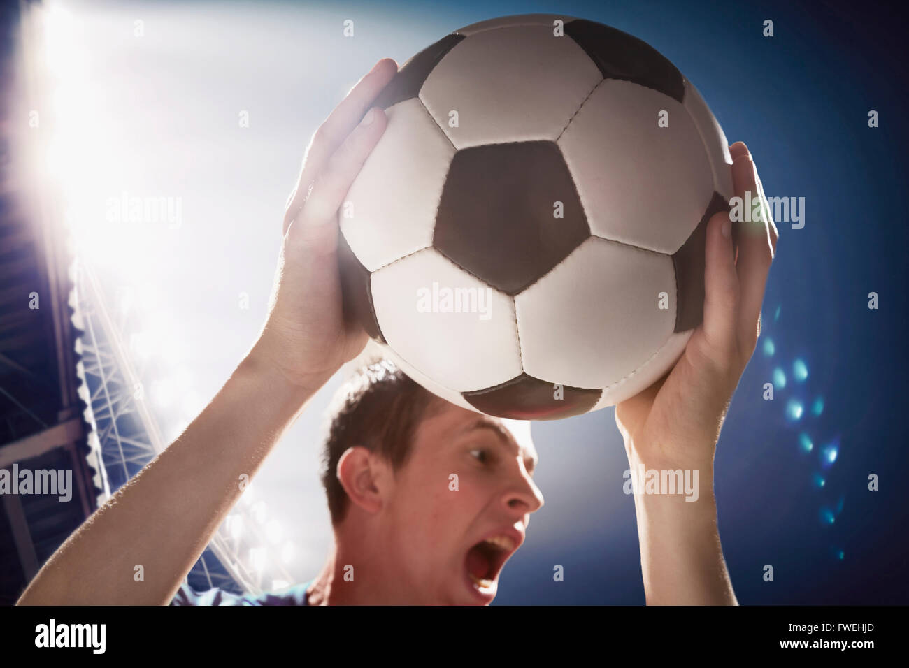 Athlete with soccer ball Stock Photo - Alamy