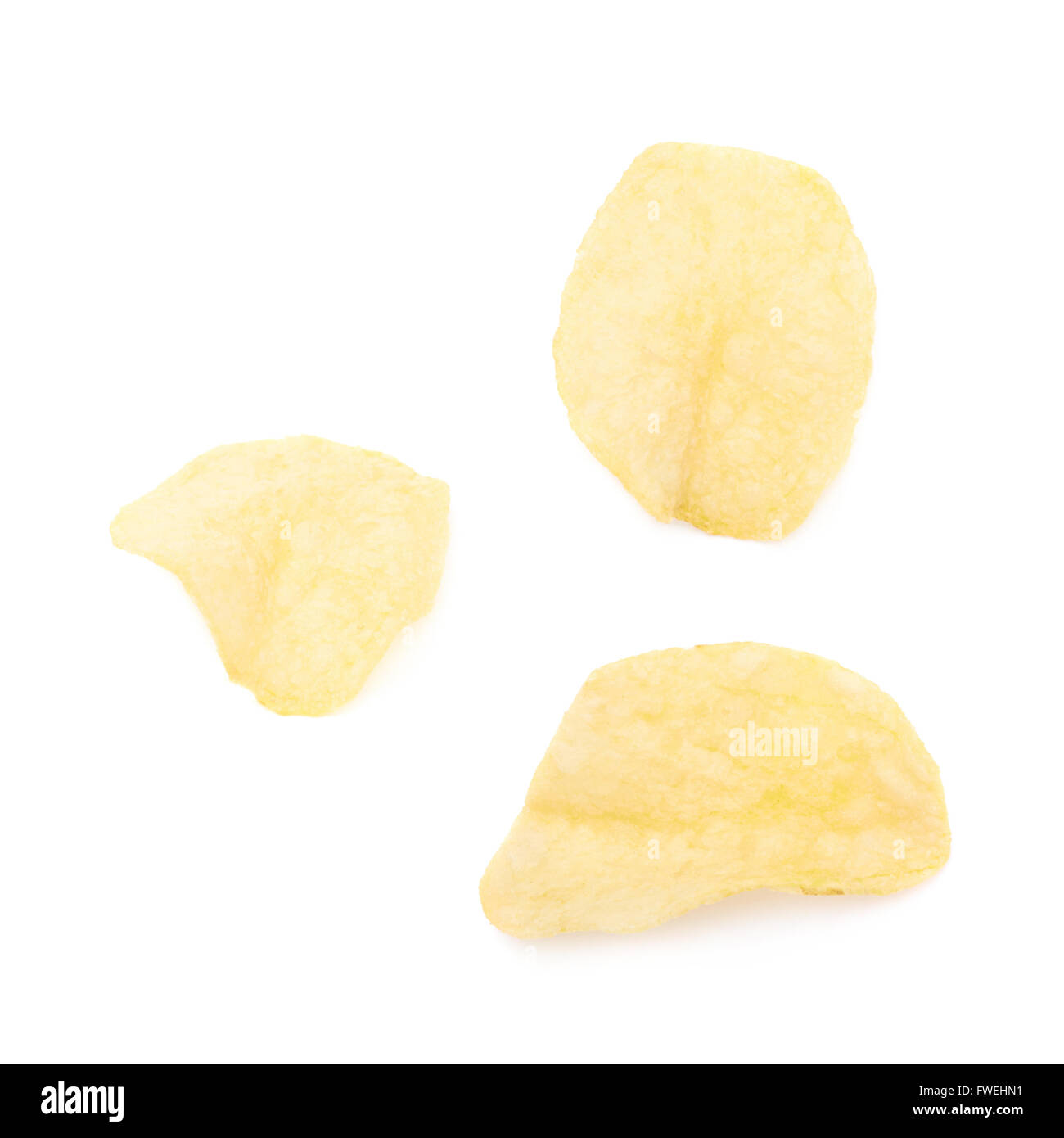 Yellow potato chips isolated Stock Photo - Alamy