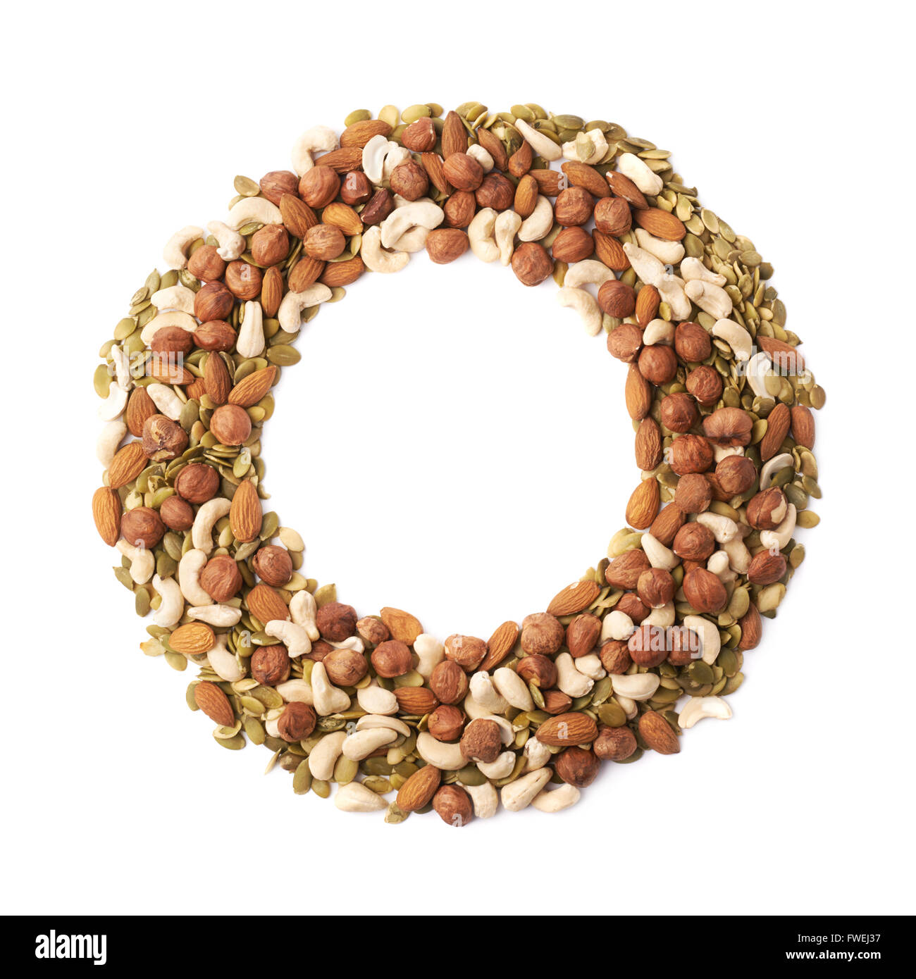 Round frame of nuts and seeds Stock Photo - Alamy