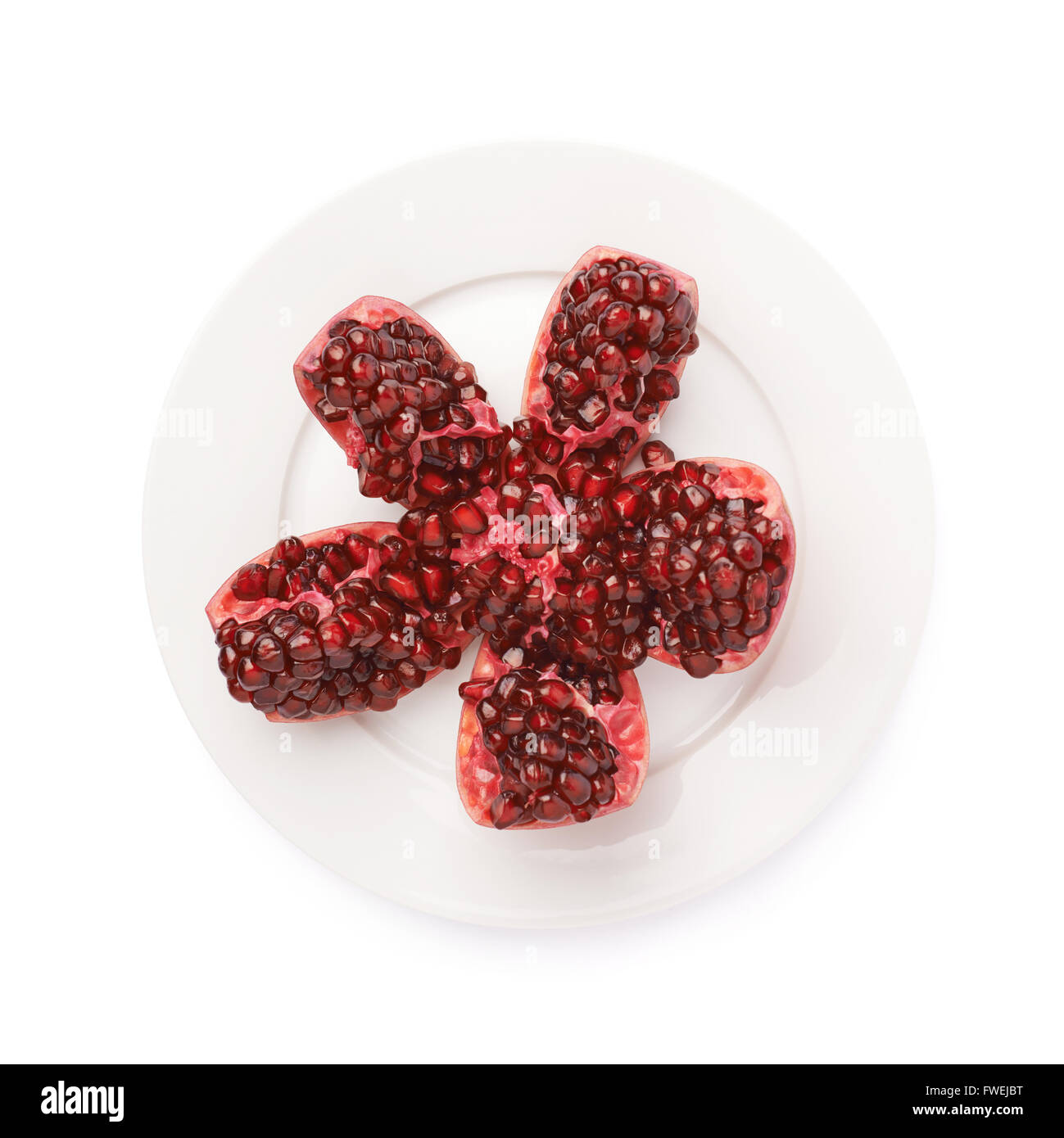 Split open pomegranate fruit Stock Photo - Alamy