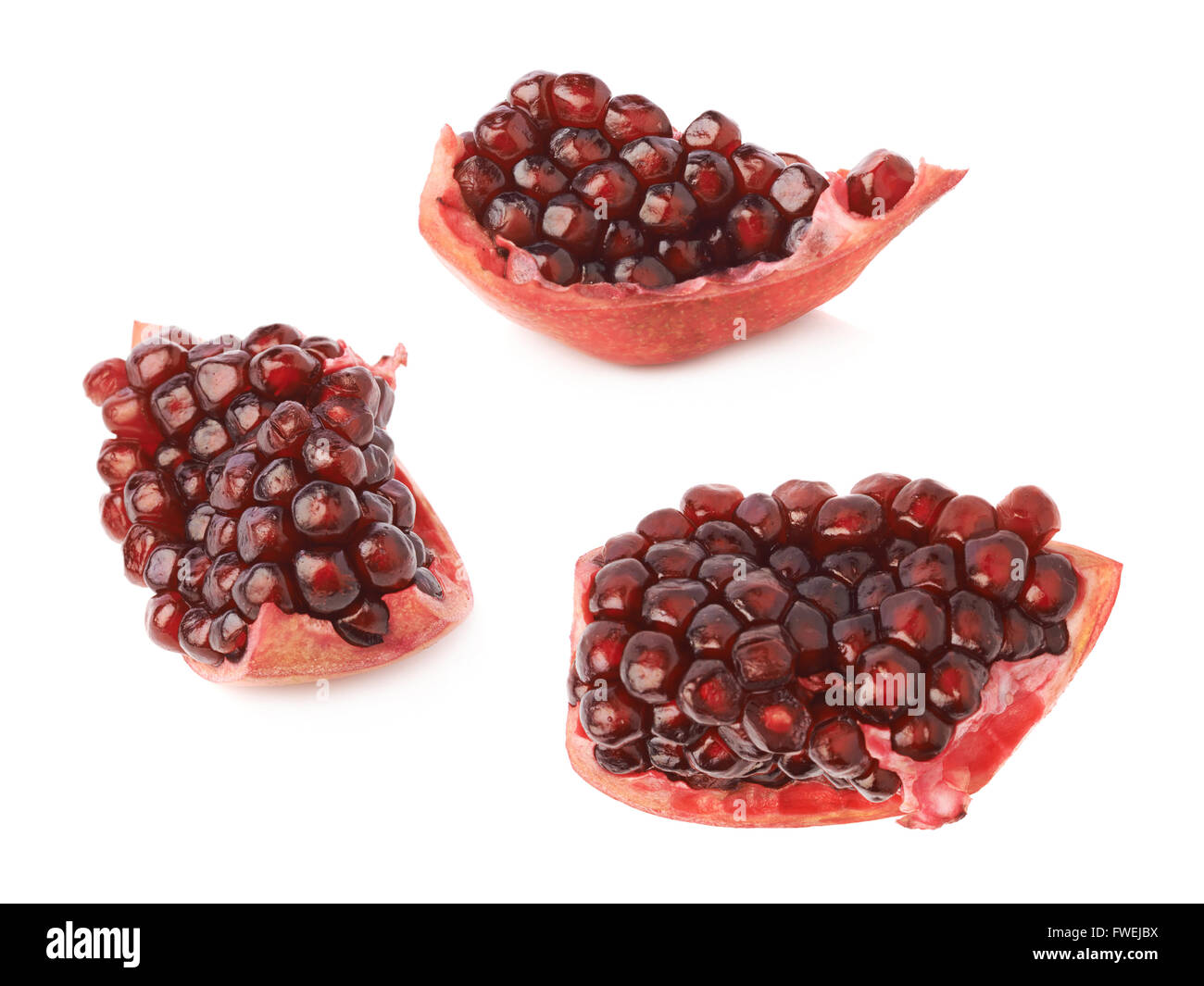 Pomegranate fruit's fragment isolated Stock Photo - Alamy