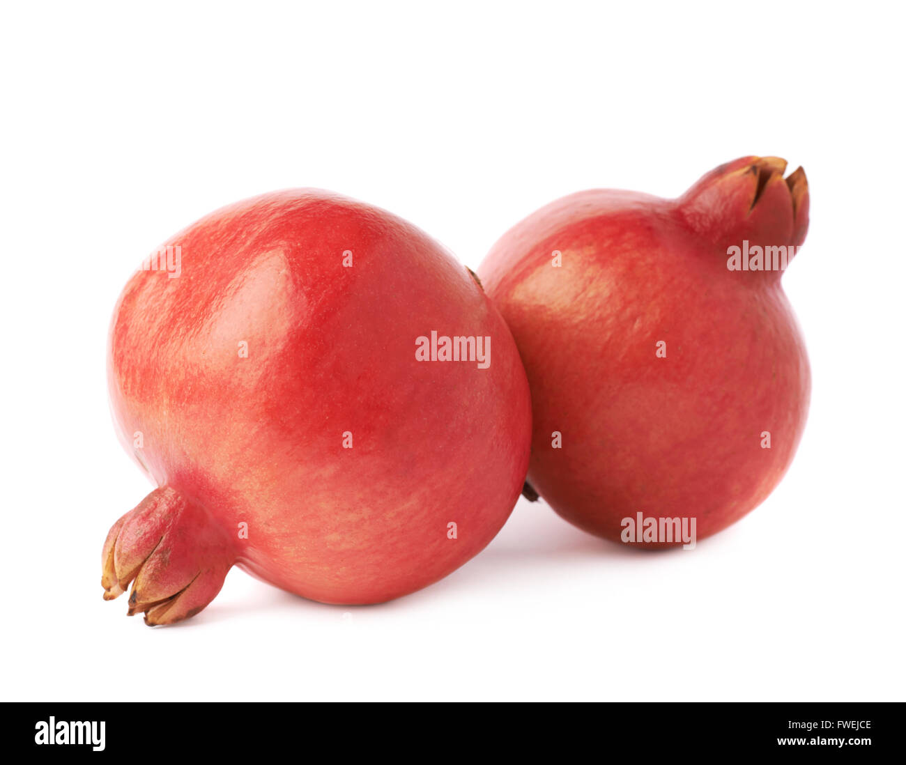 Two pomegranate composition isolated Stock Photo - Alamy