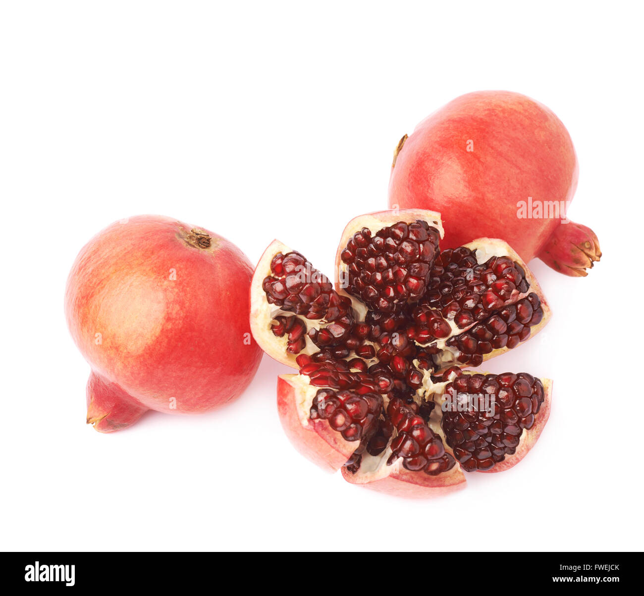 Split open pomegranate fruit Stock Photo - Alamy