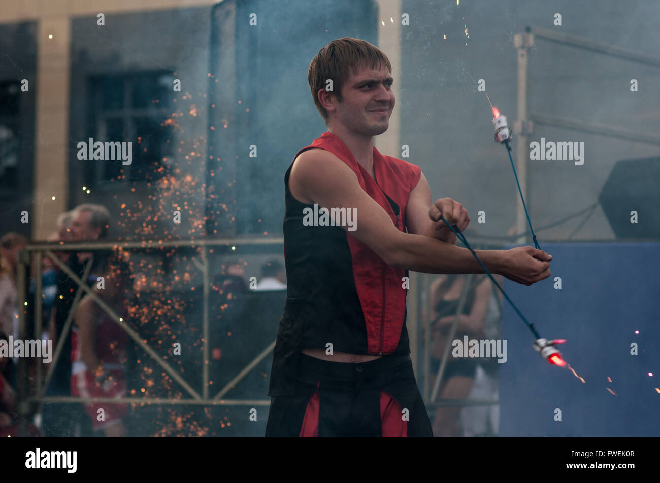 Orenburg, Russia - 25.07.2014: Juggling burning torches at sporting ...