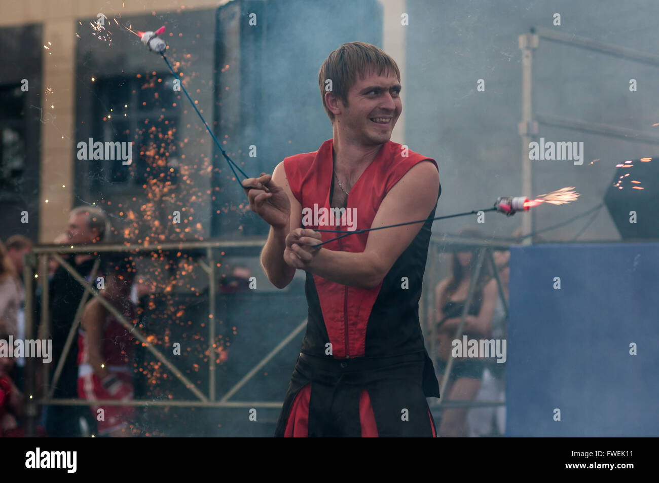 Orenburg, Russia - 25.07.2014: Juggling burning torches at sporting ...